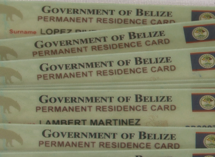 Amnesty Program Applicants Receive Permanent Residency Documents | Greater Belize Media